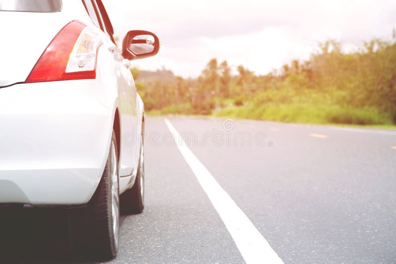 A Man Driving a Car on the Side of the Road Stock Image - Image of ...