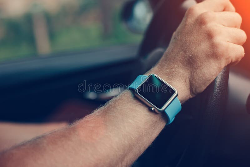 Man Driving a Car, Smart Watch on His Hand, Inside Stock Image - Image ...