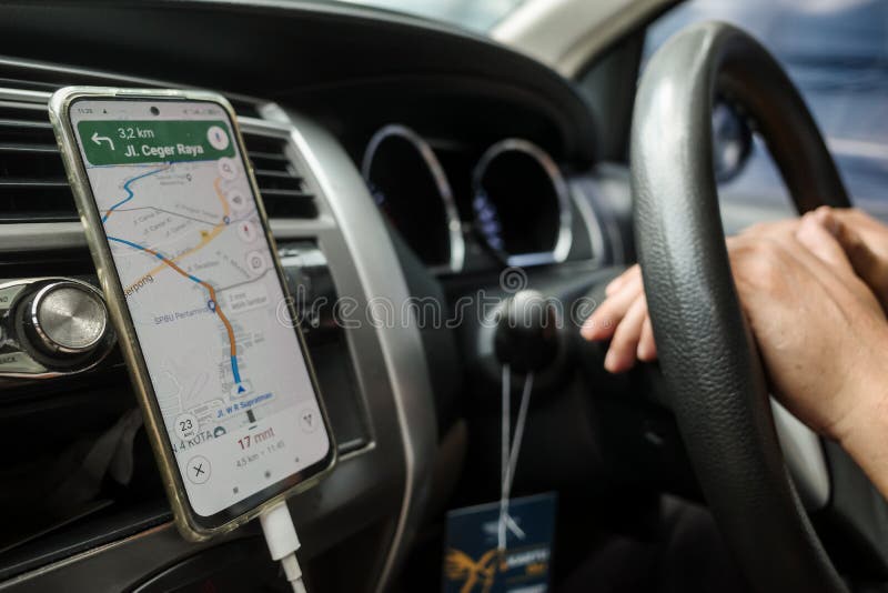 Man Driving Car Using Online Map on Smartphone for Direction Stock ...