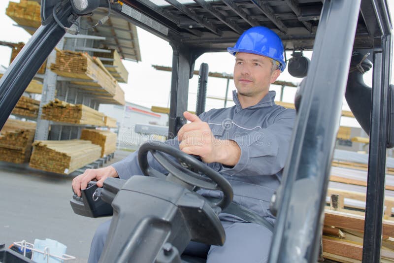 Man driving forklift stock photo. Image of safety, order - 188229138