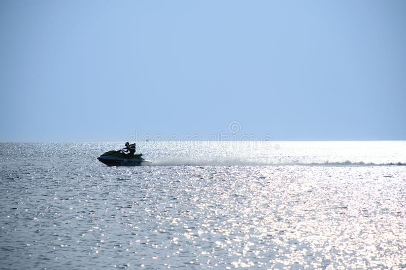 Man Driving Jet Ski at the Sea Stock Photo - Image of males, practicing ...
