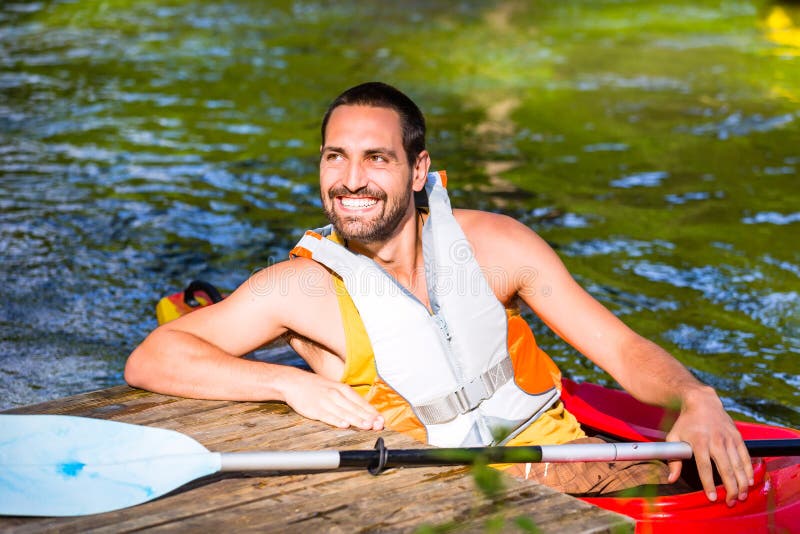 Man Driving with Kayak on Forest River Stock Photo - Image of sporty ...