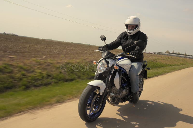 Man driving motorcycle stock photo. Image of dunlop, tyre - 39857534