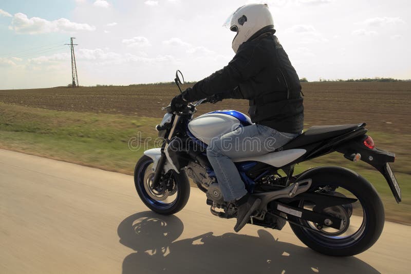 Man driving motorcycle stock photo. Image of dunlop, tyre - 39857534