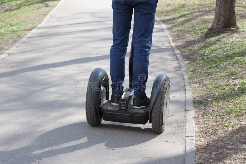 Man driving on segway stock photo. Image of active, adult - 92635698