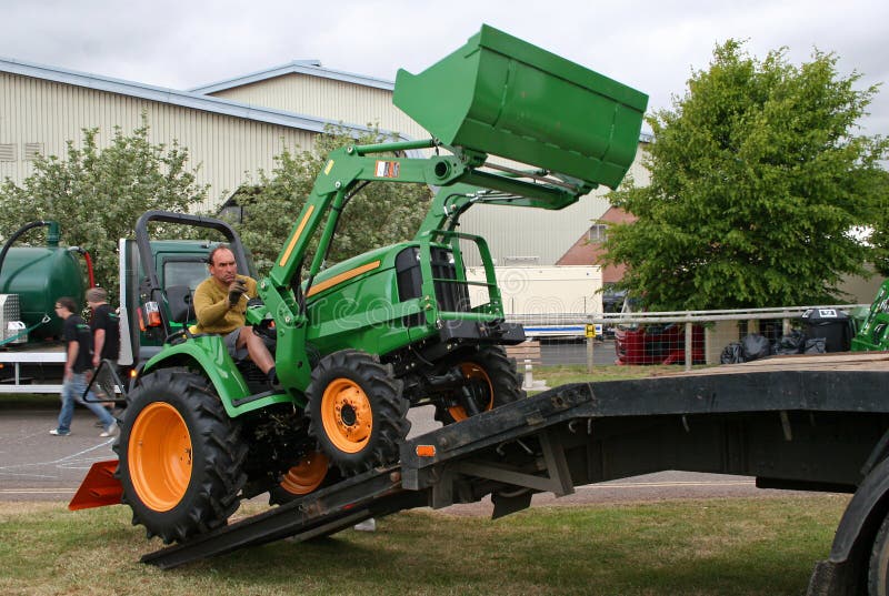 Man driving tractor stock photo. Image of horticulture - 22397044