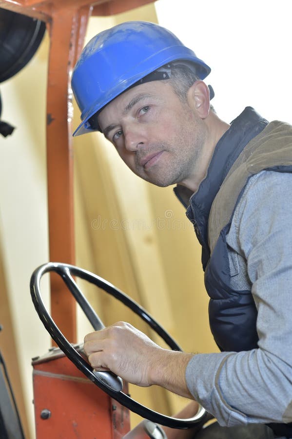 Man Driving Warehouse Trolley Stock Image - Image of carpenter ...