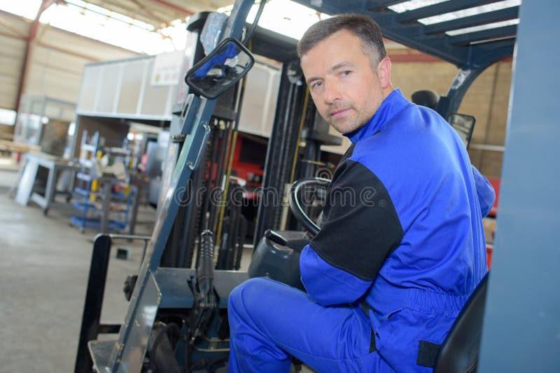 Man Driving Warehouse Vehicle Stock Image - Image of equipment, male ...