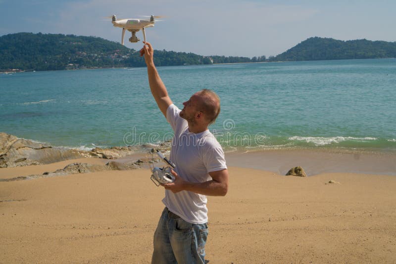 Man with Drone Camera on the Beach Stock Photo - Image of beautiful ...