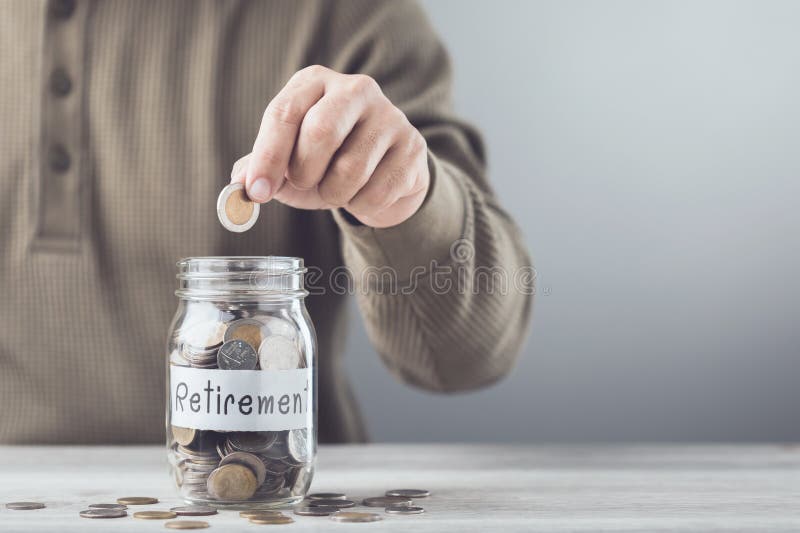 Man Dropping a Coin into a Glass Jar Labeled Retirement, Symbolizing ...