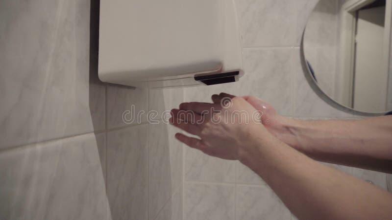 Modern hand dryer stock video. Video of public, dryer - 42599619