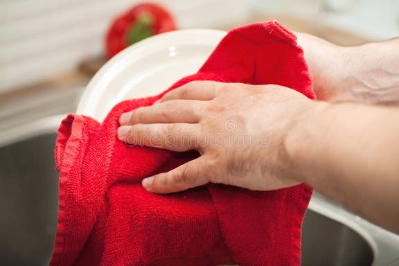 Man drying the dishes stock photo. Image of cleanse, faucet - 20808490