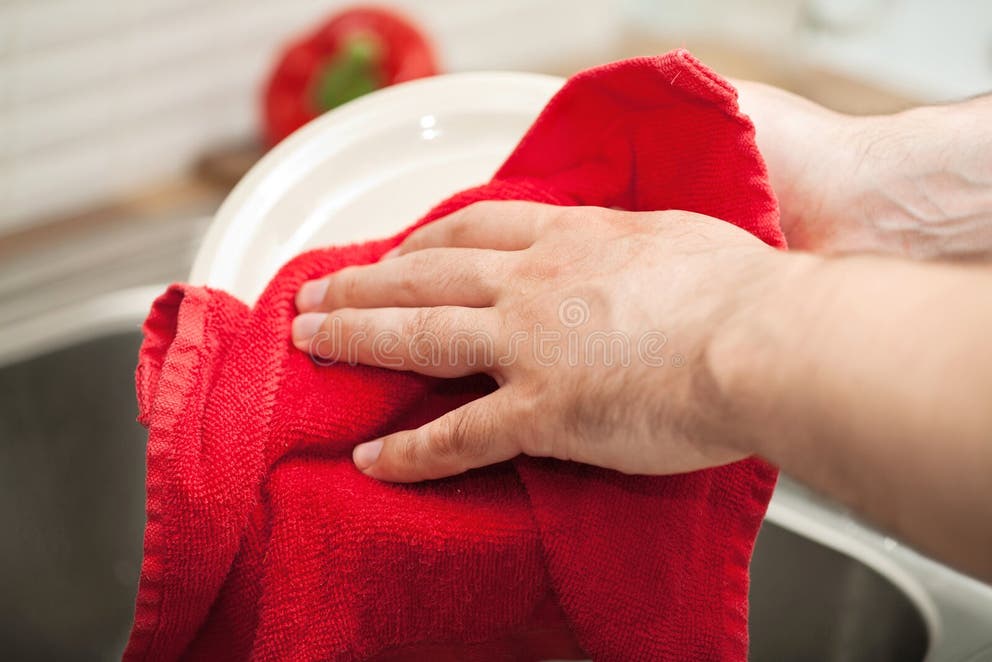 Man drying the dishes stock photo. Image of cleanse, faucet - 20808490