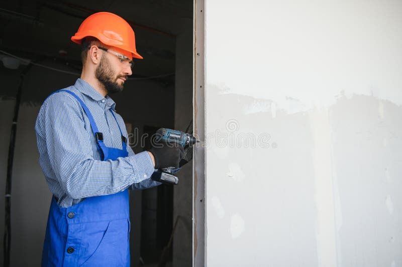 Man Drywall Worker Installing Plasterboard Sheet To Wall Stock Photo ...