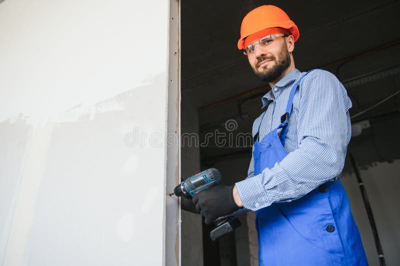 Man Drywall Worker Installing Plasterboard Sheet To Wall Stock Photo ...