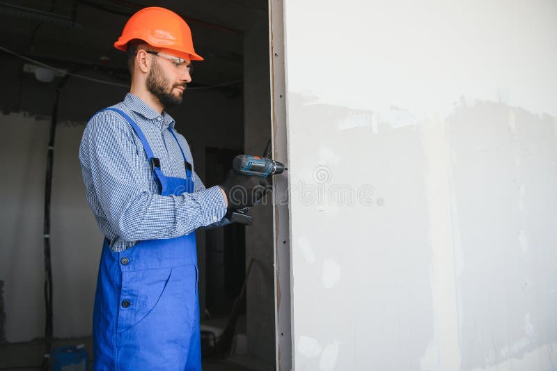 Man Drywall Worker Installing Plasterboard Sheet To Wall Stock Image ...