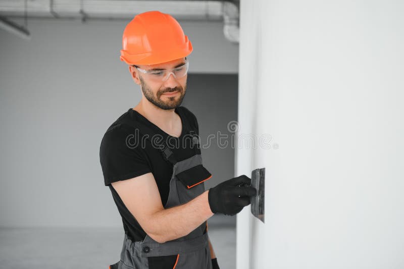 Man Drywall Worker or Plasterer Putting Mesh Tape for Plasterboard on a ...