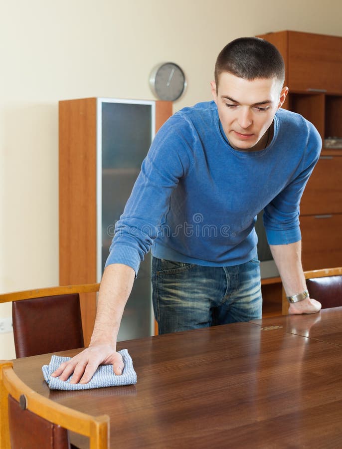 Man Dusting Table with Detergent Polish at Home Stock Image - Image of ...