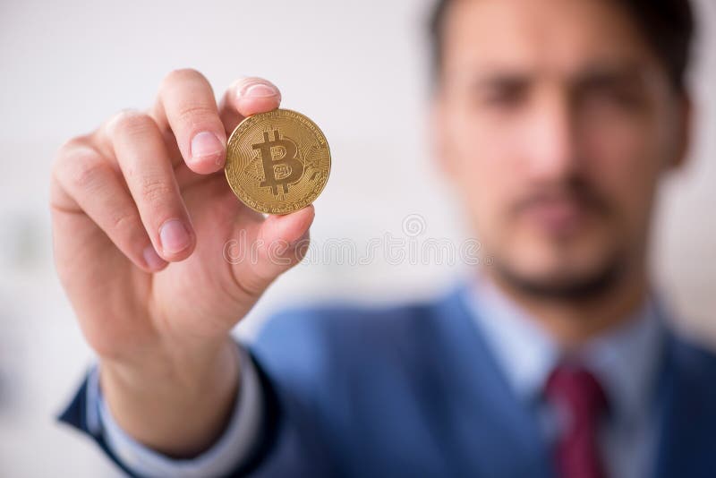 Young Man Earning Money Via Internet in Cryptocurrency Concept Stock ...