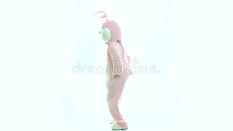Man in a Easter Bunny Costume Dances, Have Fun on White Background ...