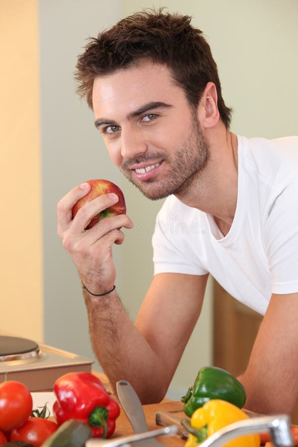 119 Young Man Posing Eating Apple Stock Photos - Free & Royalty-Free ...