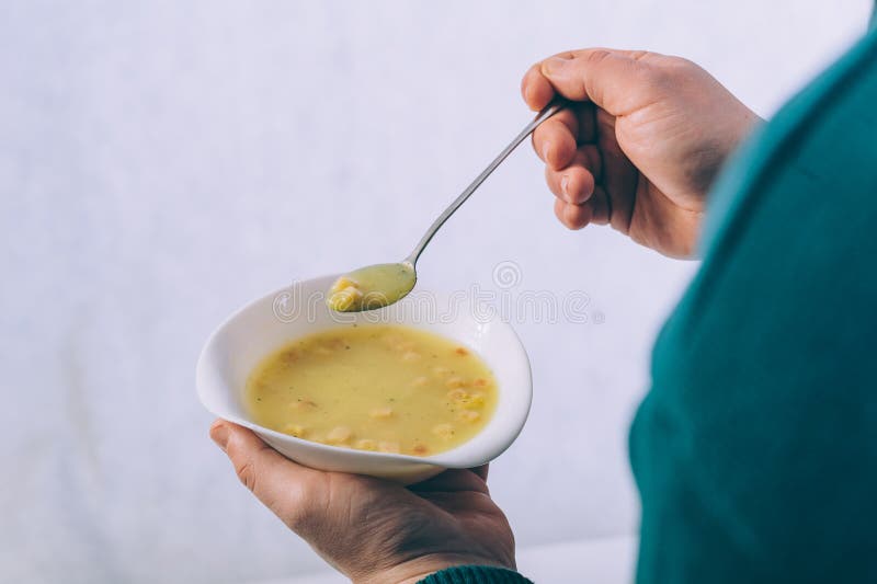 The Man is Eating Broth Soup from a Bowl Stock Photo - Image of hand ...