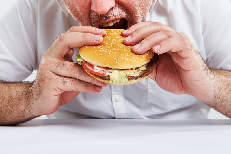 Man eating burger stock image. Image of hungry, health - 54881843