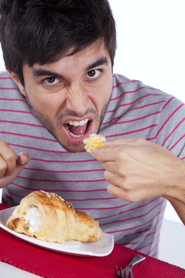 Man eating a cake stock image. Image of calories, junk - 18646629