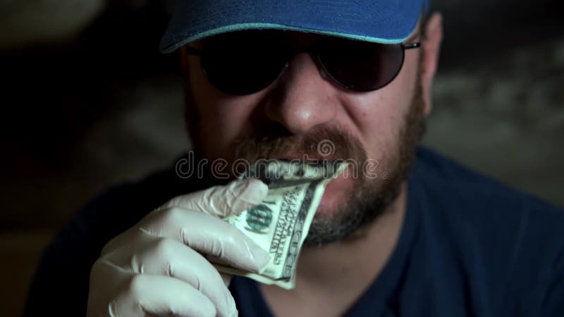 The Man is Eating a Dollar Bill Stock Footage - Video of food ...