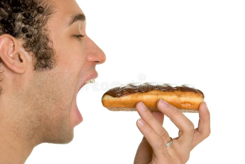 Man Eating Donut stock image. Image of holding, food - 20915875