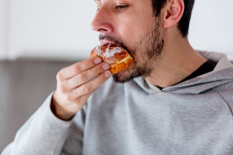 6,843 Man Eating Pastry Stock Photos - Free & Royalty-Free Stock Photos ...