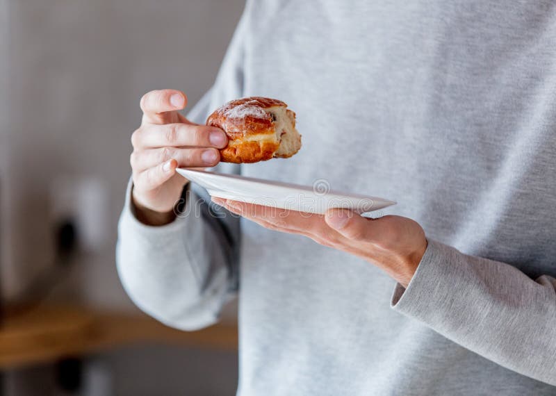 Man Eating Donut on Breakfast at Kitchen Stock Image - Image of closeup ...