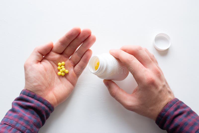 Man Eating Pills Pill Bottle Photos - Free & Royalty-Free Stock Photos ...