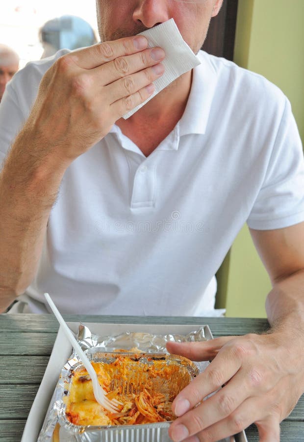 Man eating fast food stock photo. Image of community - 31789272