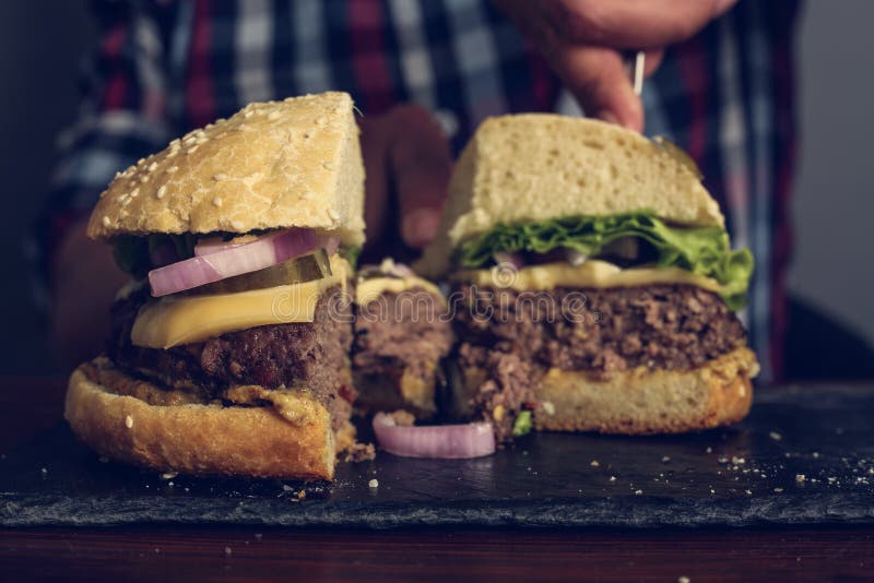 Man eating burger stock photo. Image of chef, caucasian - 118743594