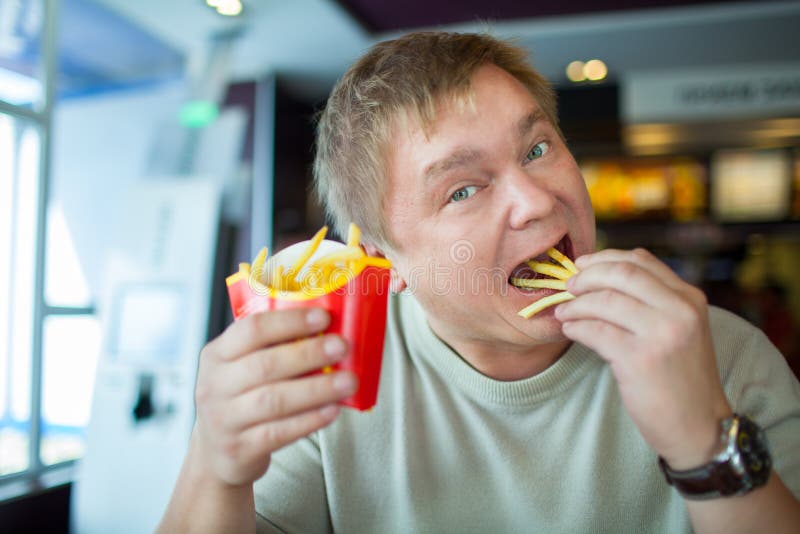 Family Eating Pizza and Fries at Home Stock Image - Image of parent ...