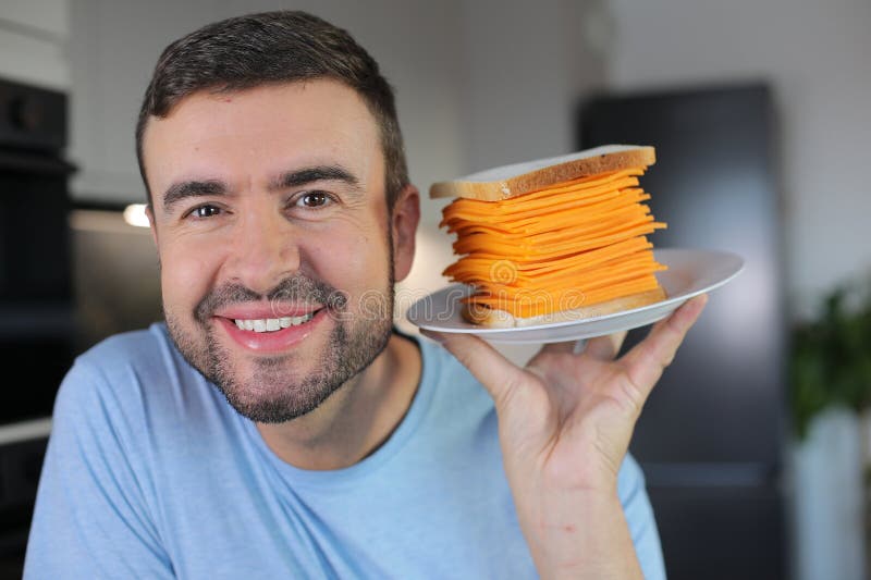 Man Eating a Gigantic Cheese Sandwich Stock Photo - Image of gigantic ...