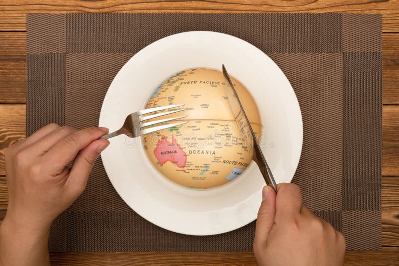 A Man Eating a Globe Concept of Overusing the Resource of Nature Stock ...