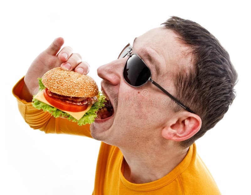 Man eating hamburger stock photo. Image of unhealthy - 12942814