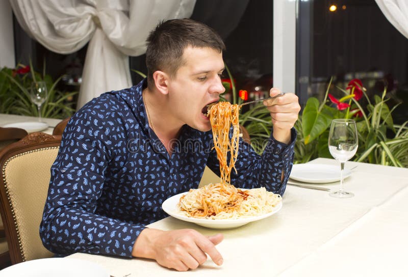Man Eating a Large Portion of Pasta Stock Image - Image of adult ...