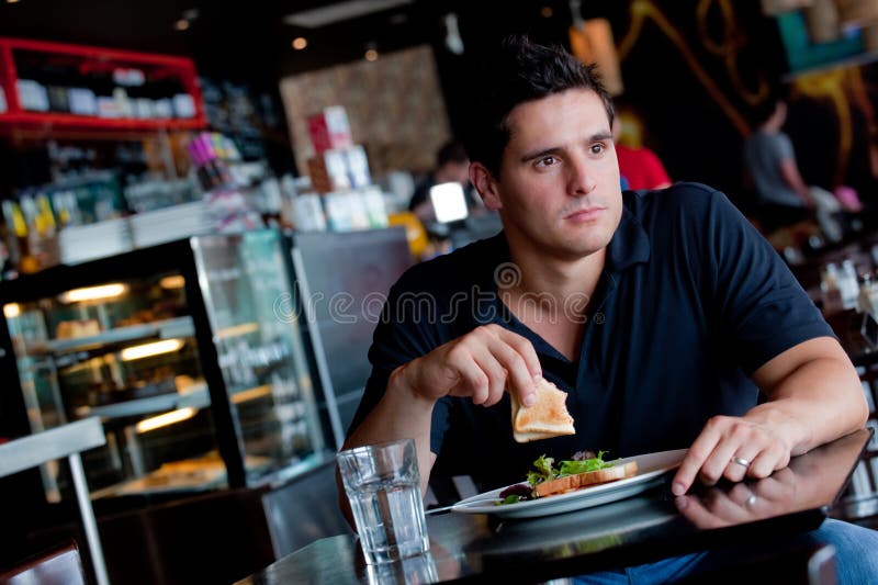 Man Eating Lunch stock photo. Image of cafe, handsome - 8315824