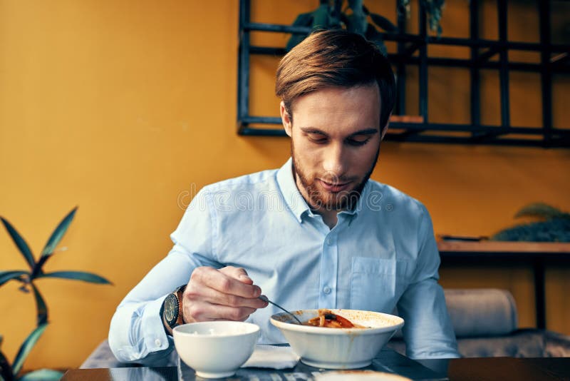Man Eating Lunch at Cafe Table Break at Work and Interior Stock Photo ...