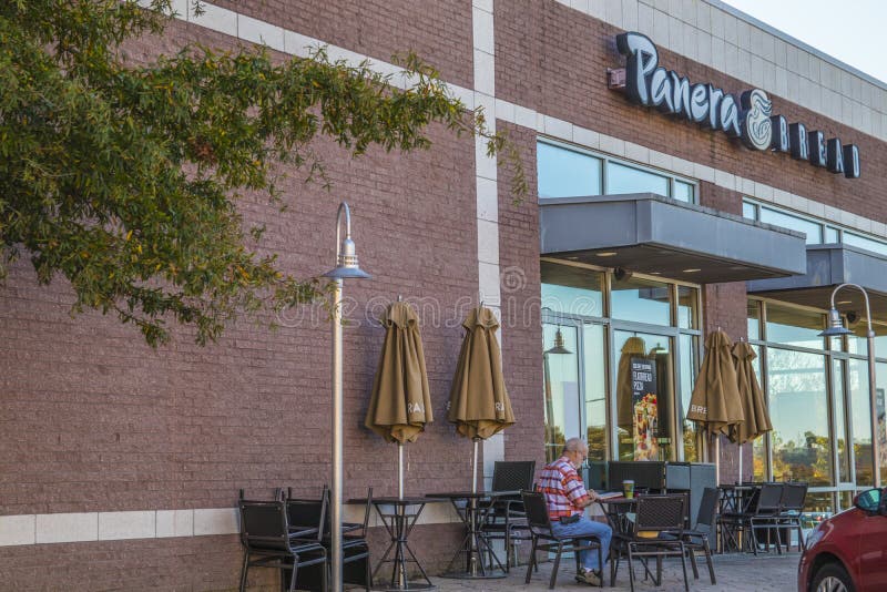 Man Eating Outside at Panera Bread Editorial Photo - Image of customer ...