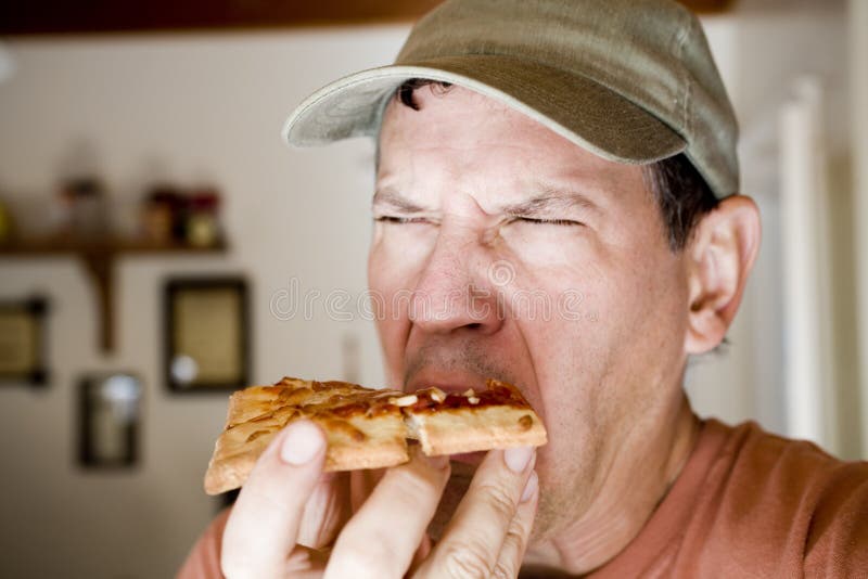 Man Eating Pepperoni Pizza stock photo. Image of share - 1332068
