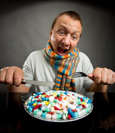Man eating pills stock image. Image of illness, hungry - 26560061