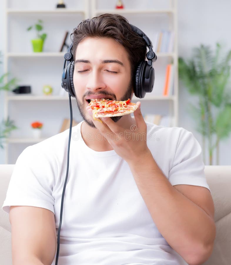 Man Eating Pizza Having a Takeaway at Home Relaxing Resting Stock Photo ...