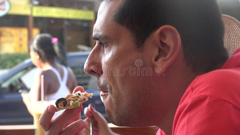 A Man Eating Pizza Slice stock video. Video of slices - 261338213