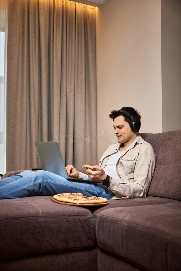 Man Eating Pizza while Using Laptop at Home Stock Image - Image of ...