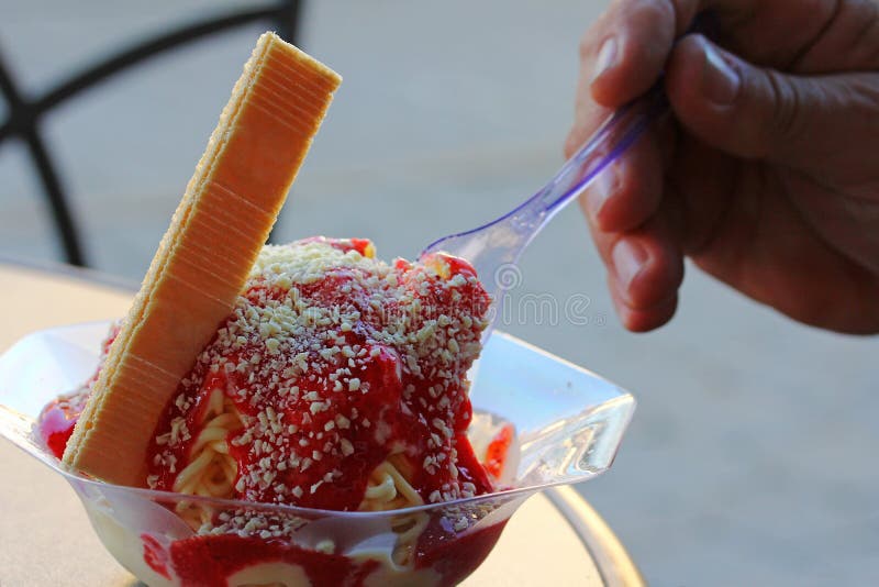 A man is eating a sundae stock photo. Image of sauce - 90638402