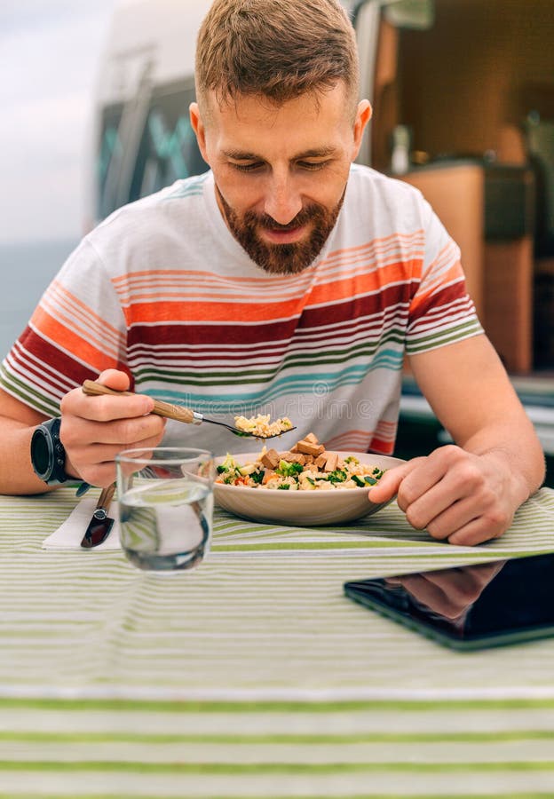 Man Eating Vegan Food Outdoors Stock Image - Image of fork, natural ...